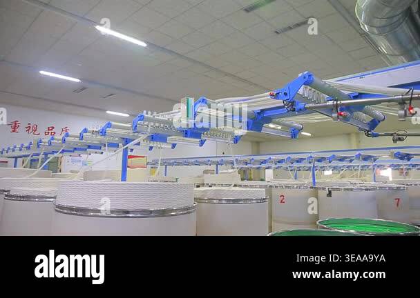 Cotton group in spinning production line factory, rotating mechanical ...