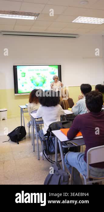 University professor teaching an environmental science class. Diverse ...