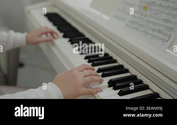 Teenage girl practicing piano at home. Focused young cute girl having ...