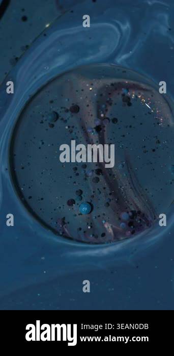 Vertical video. Oil texture. Ink art. Defocused blue purple color ...