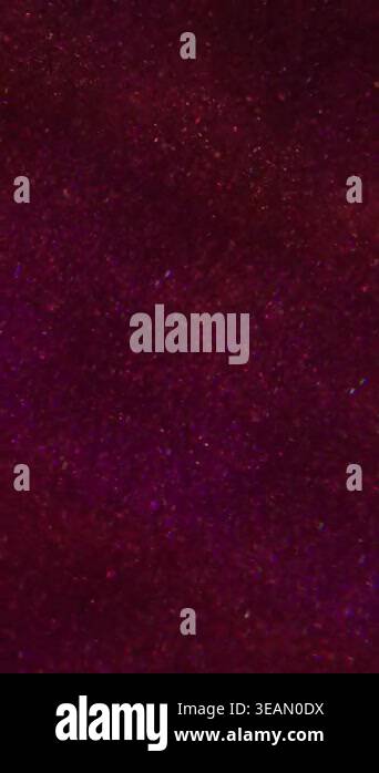 Vertical video. Blur particles. Glitter texture. Red purple neon color ...