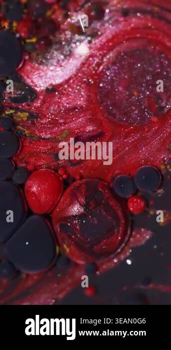 Vertical video. Bubble texture. Paint mix. Defocused red yellow purple ...