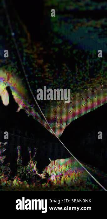 Vertical video. Digital error. Static distortion. Blue yellow pink ...