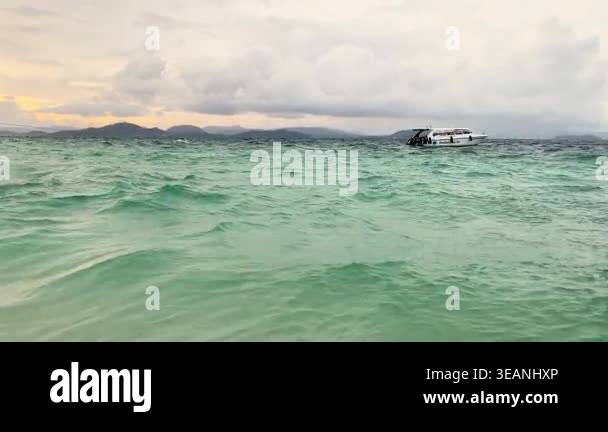 Khai Nok Island, Thailand - October 25, 2025. Golden sunset sky over ...