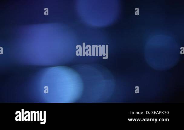 Soft blue bokeh lights create a dreamy, ethereal atmosphere with ...