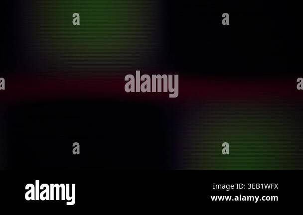 An abstract dark motion background featuring subtle shifting light ...