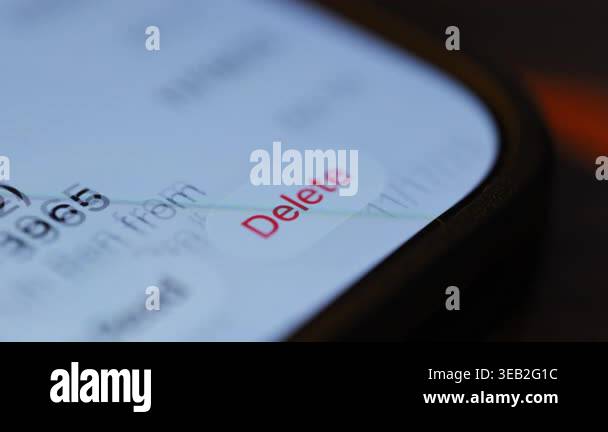Finger tapping Settings app icon on iPhone screen. Close up of iOS ...