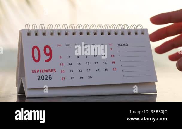 Slow motion footage of flip calendar pages for change months from ...