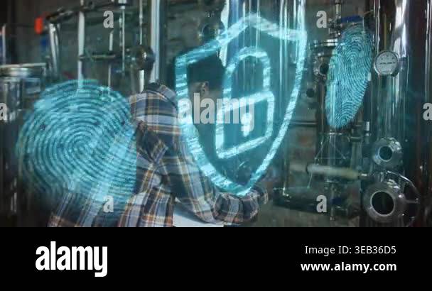 Process engineer checking valve in processing bay, scanning fingerprint ...