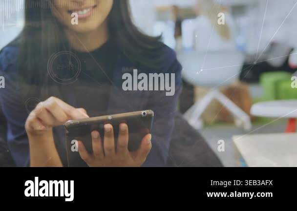 Animation of data processing over businesswoman using tablet. Global ...