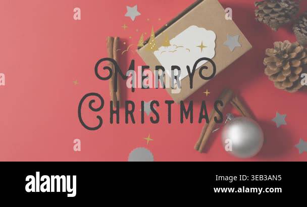 Animation of merry christmas text banner over christmas decorations on ...