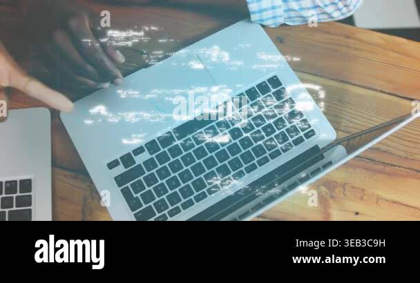 Animation of icons over diverse people using laptop. Global technology ...