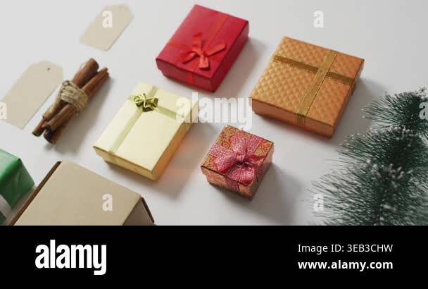 Animation of merry christmas text over christmas presents. Christmas ...