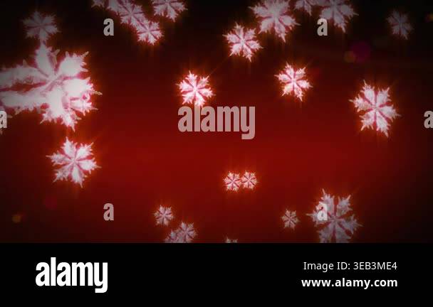 Animation of snowflakes floating over bright spot of light against red ...