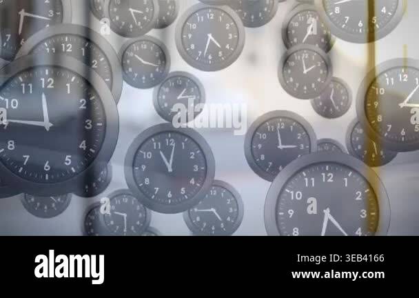 Animation of multiple ticking clocks falling against blurred view of ...