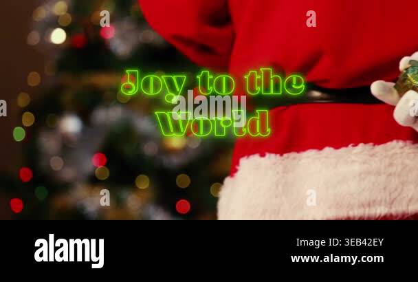 Animation of neon green joy to the world text banner over santa claus ...