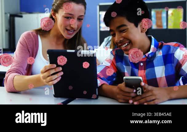 Multiple pink rose flower icons over diverse boy and girl using digital ...