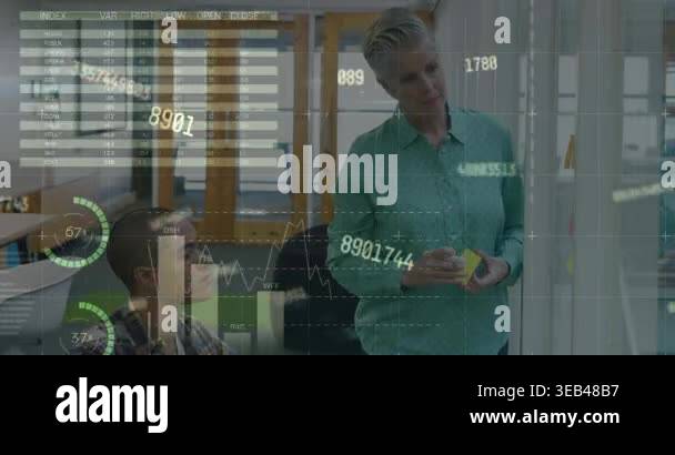 Animation of data processing against diverse man and woman discussing ...