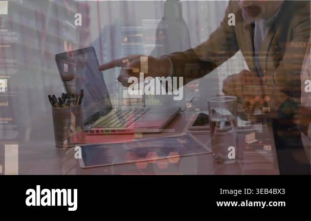 Animation of data processing over mid section of businessman and ...