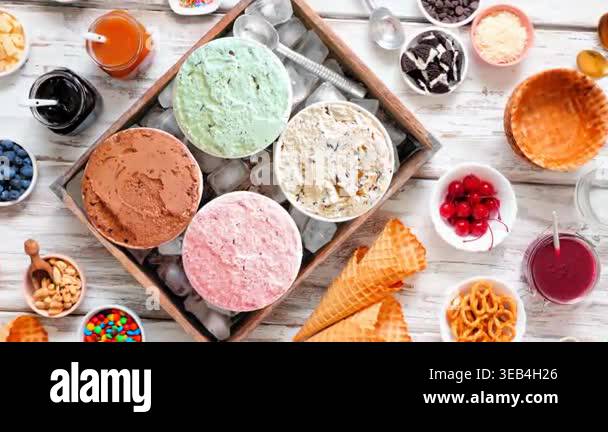 Summer ice cream buffet with a variety of ice cream flavors and sweet ...