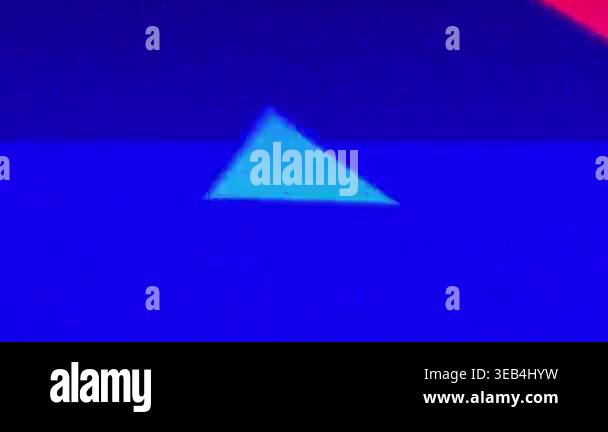 Animation of sale text with looping triangles over color splash, lens ...