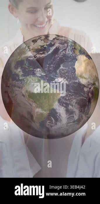 Vertical video: Globe overlay over woman and boys causing smiles ...