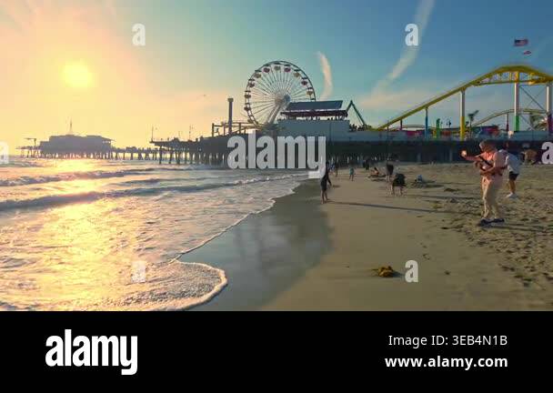Santa Monica beach view toward the pier with Ferris wheel and roller ...