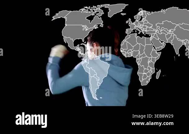 Woman shadowboxing from guard, turning while training fitness with grey ...