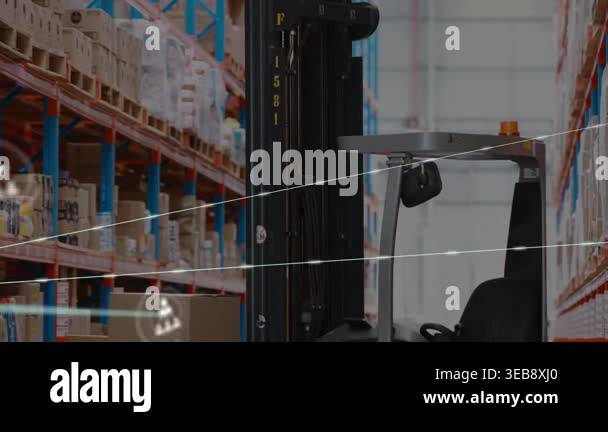 Operating machinery in warehouse, workers with network connections and ...