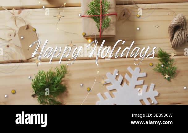 Animation of happy holidays text over stars and christmas decorations ...