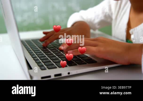 Multiple red heart icons floating over close up of asian girl using ...