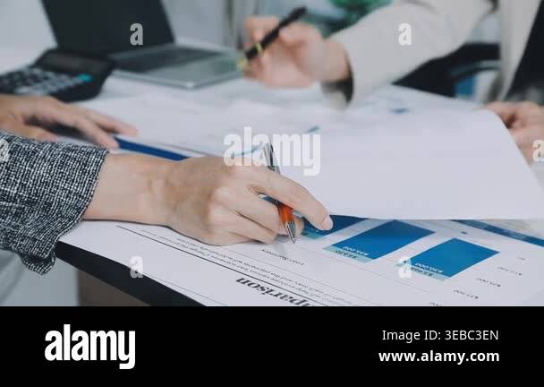 business people discussing and analyzing charts Stock Video Footage - Alamy