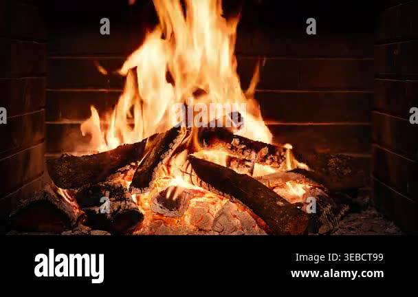 Video of lit fireplace at night Stock Video Footage - Alamy