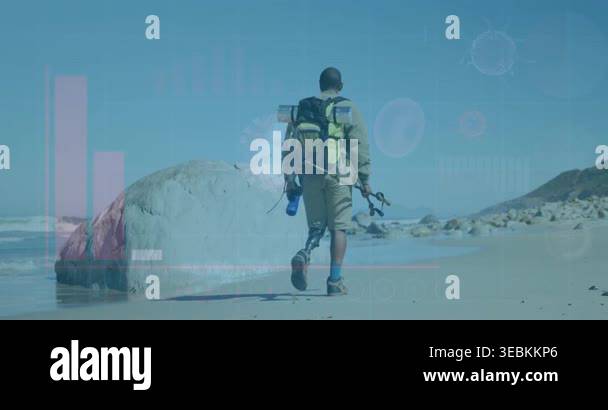 Walking on beach, man with animation overlay of graphs and charts. Data ...