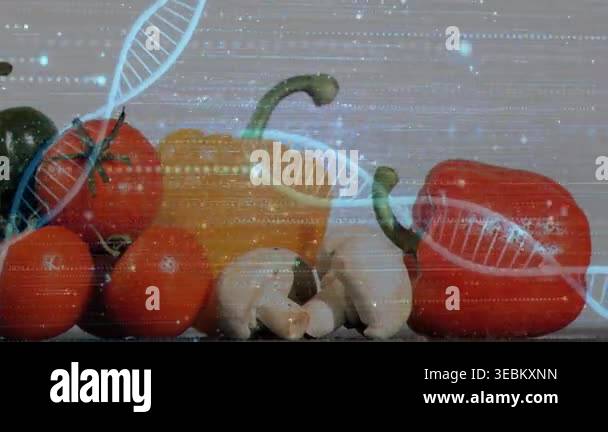 Left glowing DNA helix emerging and moving across vegetables, particles ...