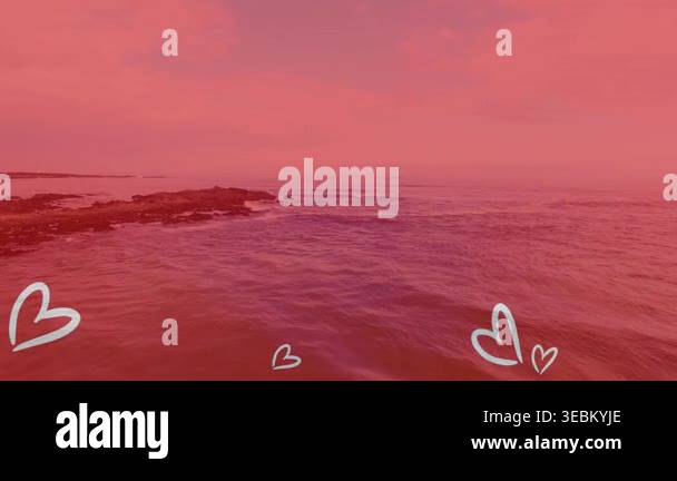 After few seconds white hearts appearing at ocean shore drifting up ...