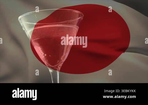 Cocktail glass holding liquid while fruits dropping offscreen, causing ...