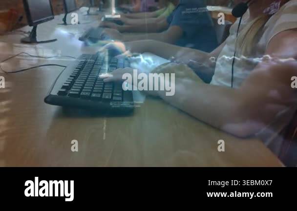 Animation of binary code over class of diverse pupils using computers ...