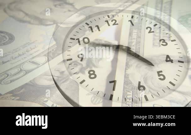 On play, analog clock face moving clockwise over layered US banknotes ...