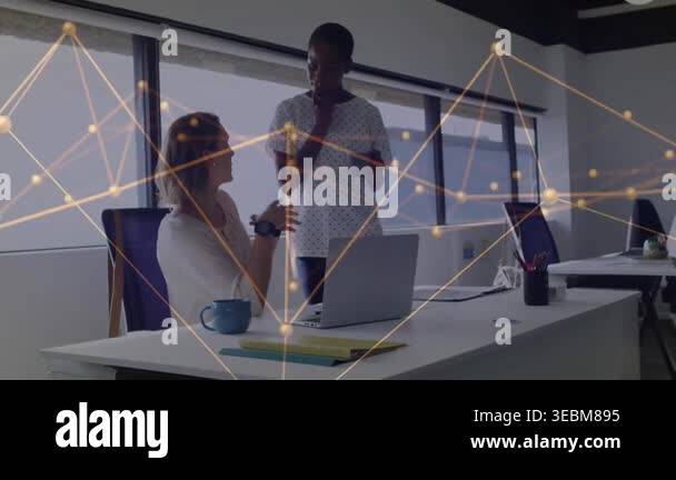 Discussing work, colleagues in office with network and data processing ...