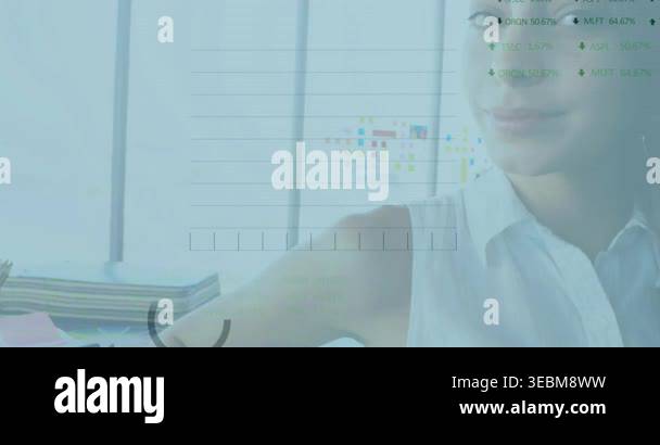 Female finance professional standing by window showing digital area ...