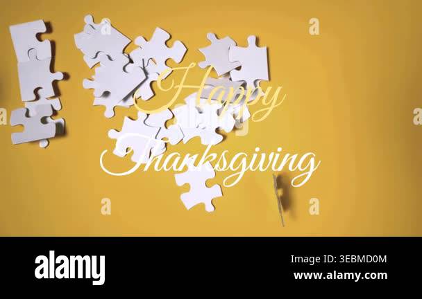 Animation of happy thanksgiving text over puzzle pieces on yellow ...