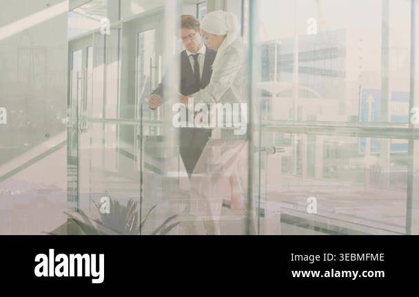 Animation of office building over business people talking in modern ...
