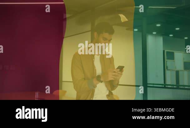 Using smartphone, man with colorful animation shapes overlaying office ...