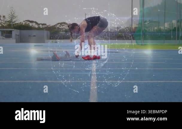 Female athlete placing blocks and preparing sprint start, sports tech ...
