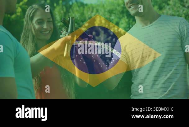 Holding drinks outdoors, people celebrating with Brazilian flag ...