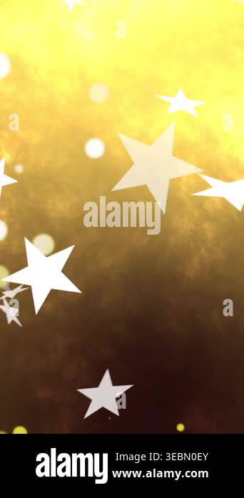 Vertical video: Gold flare starting white stars drifting down and ...