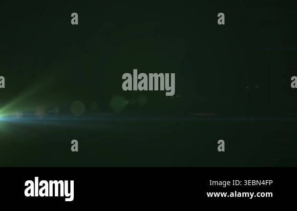Digital animation of spot of light against copy space on green ...