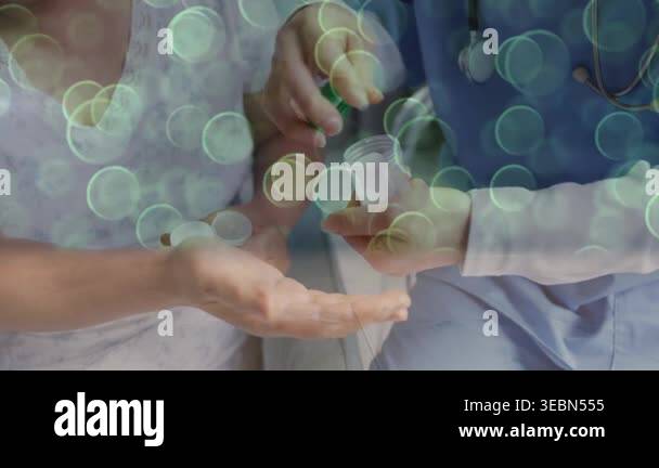 Animation of light spots over diverse doctor and patient. Global ...
