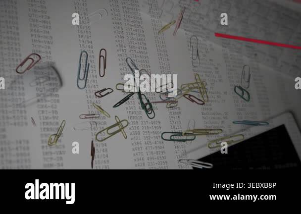 Cluster of multicolor paperclips dropping and scattering across numeric ...
